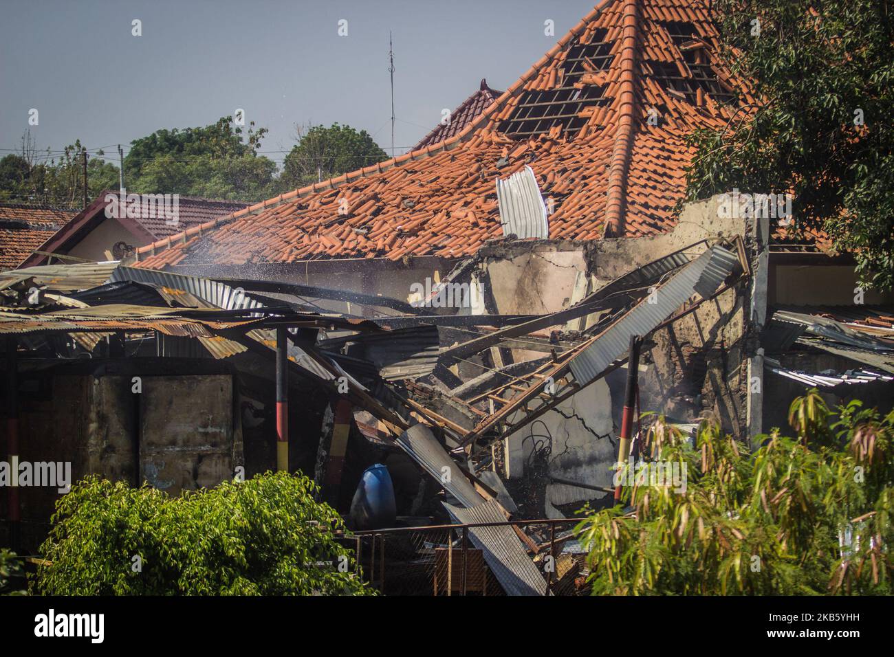 A destroyed warehouse in Semarang, Central Java, Indonesia, following ...