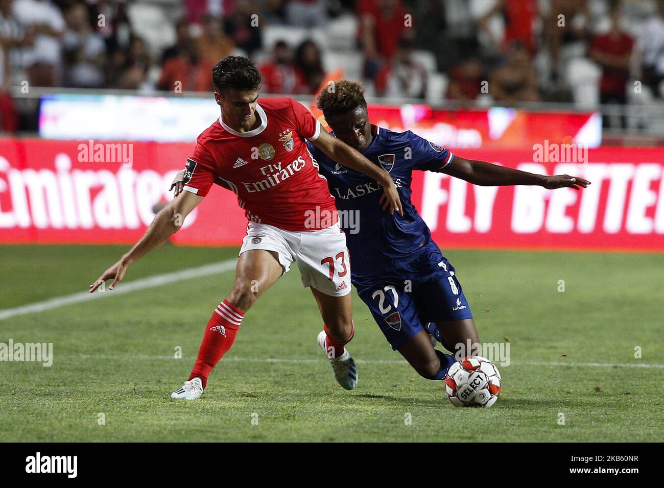Jota of Benfica (L) vies for the ball with Yves Baraye of Gil Vicente ...