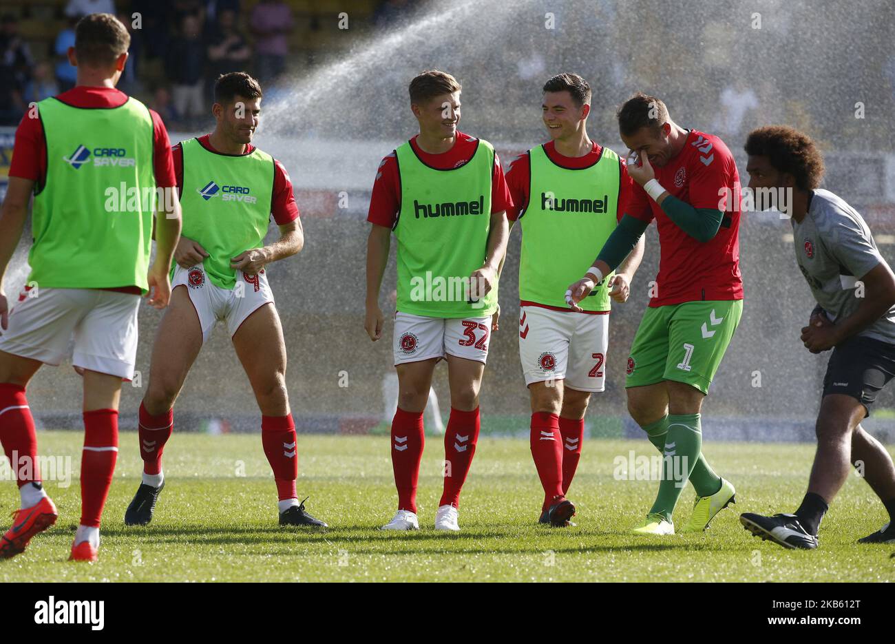 L-R Ched Evans, Harvey Saunders and Harrison Biggins of Fleetwood Town ...