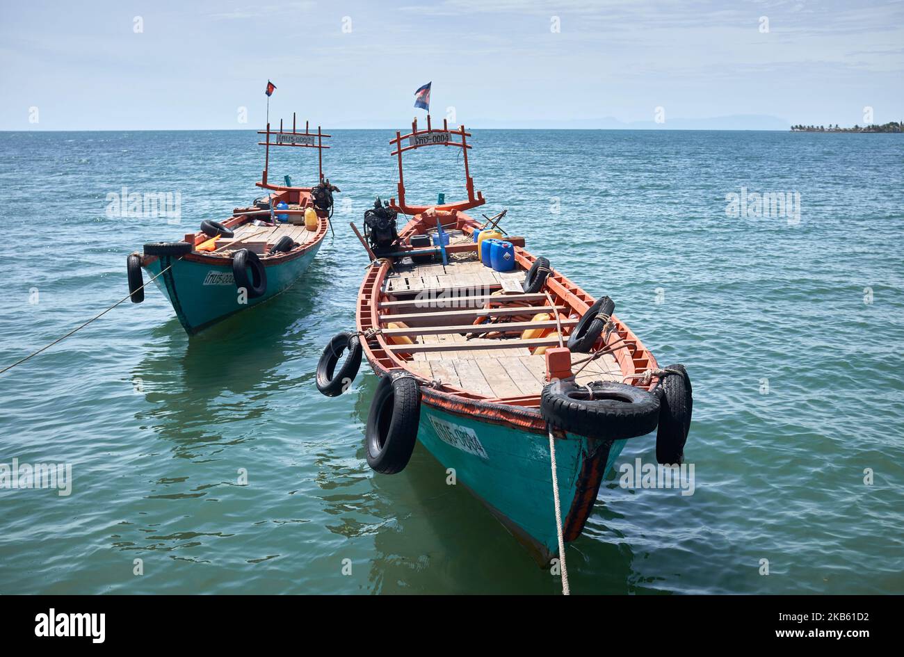 Traditional Fishing Boats near Kep Market in Cambodia Stock Photo - Alamy
