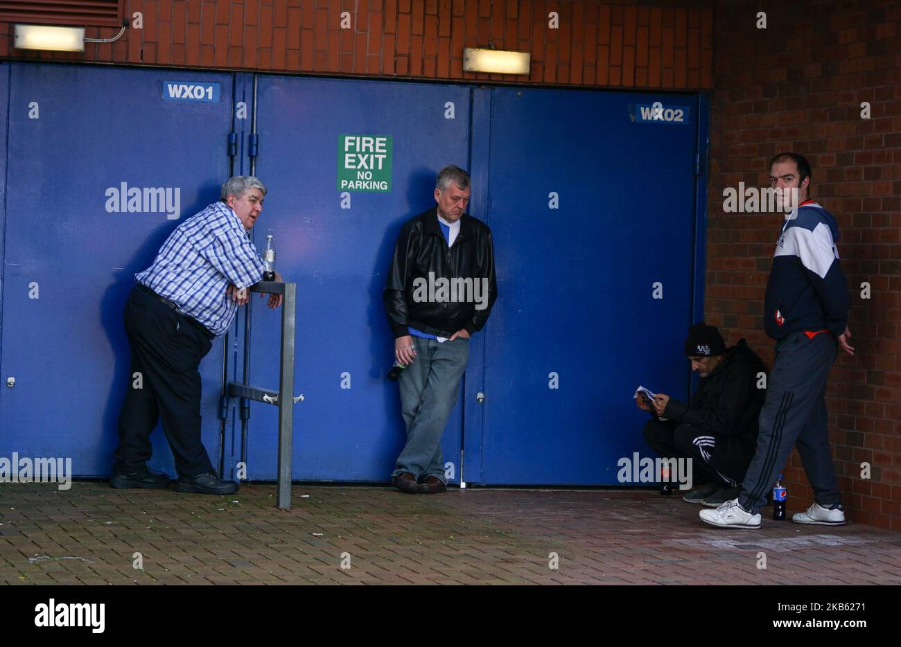 Blackburn rovers fans wait outside of the stadium of Blackburn Rover at ...
