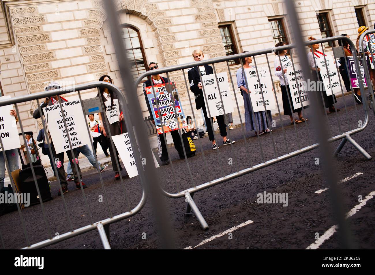 Members of climate change activist group Extinction Rebellion protest ...