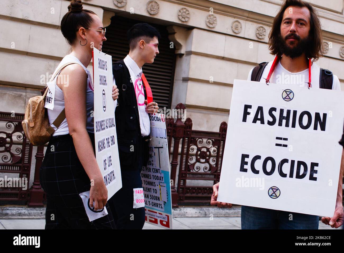 Members of climate change activist group Extinction Rebellion protest ...