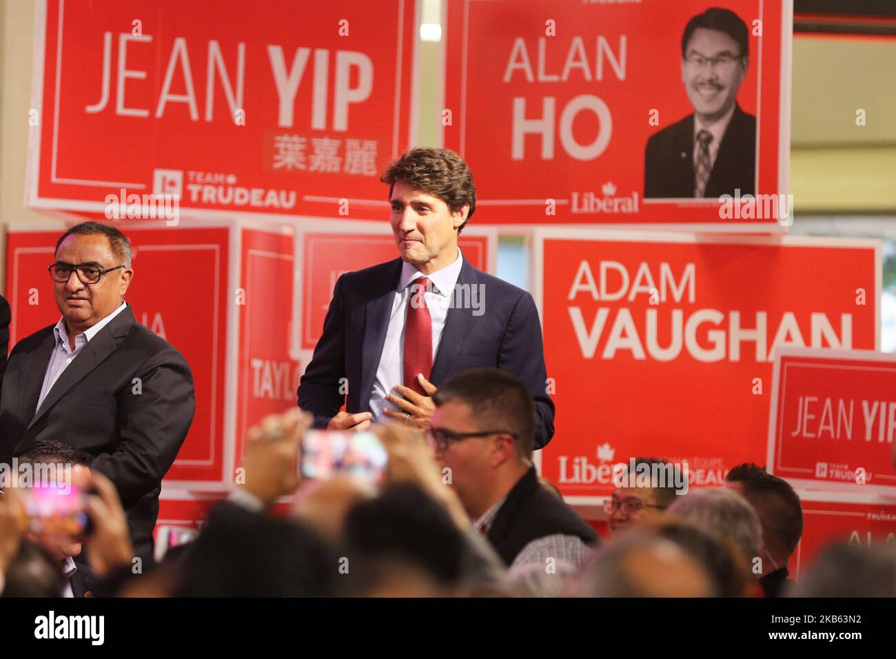 Justin Trudeau is greeted by supporters during an election rally in ...