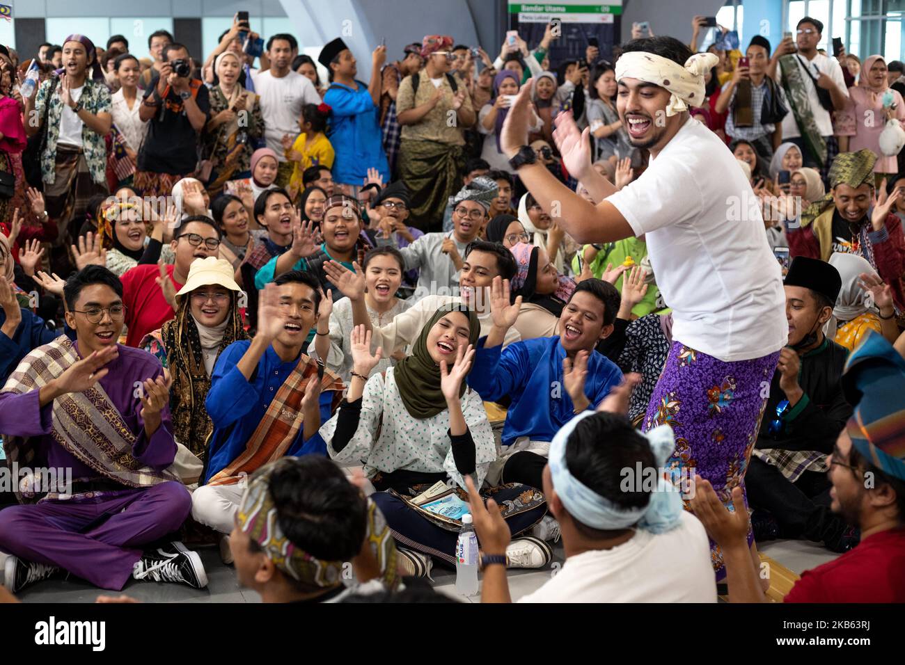Participants sing and dance during 2019 Malaysia Day Celebrations at ...