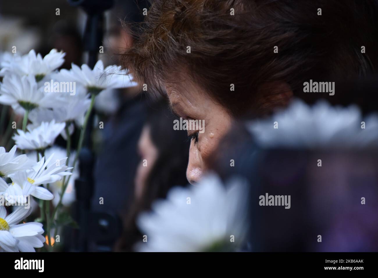 People crying during earthquake hi-res stock photography and images - Alamy