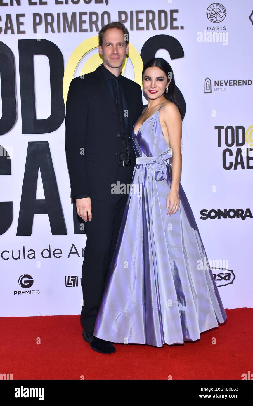 Martha Higareda, Cory Brusseau poses for photos during 'Todos Caen' film premiere at Cinepolis ...
