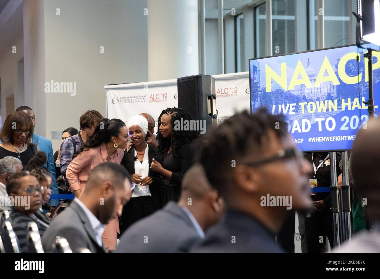 Center L-R: Moderator Angela Rye, political strategist & CNN political commentator, talks to U.S ...