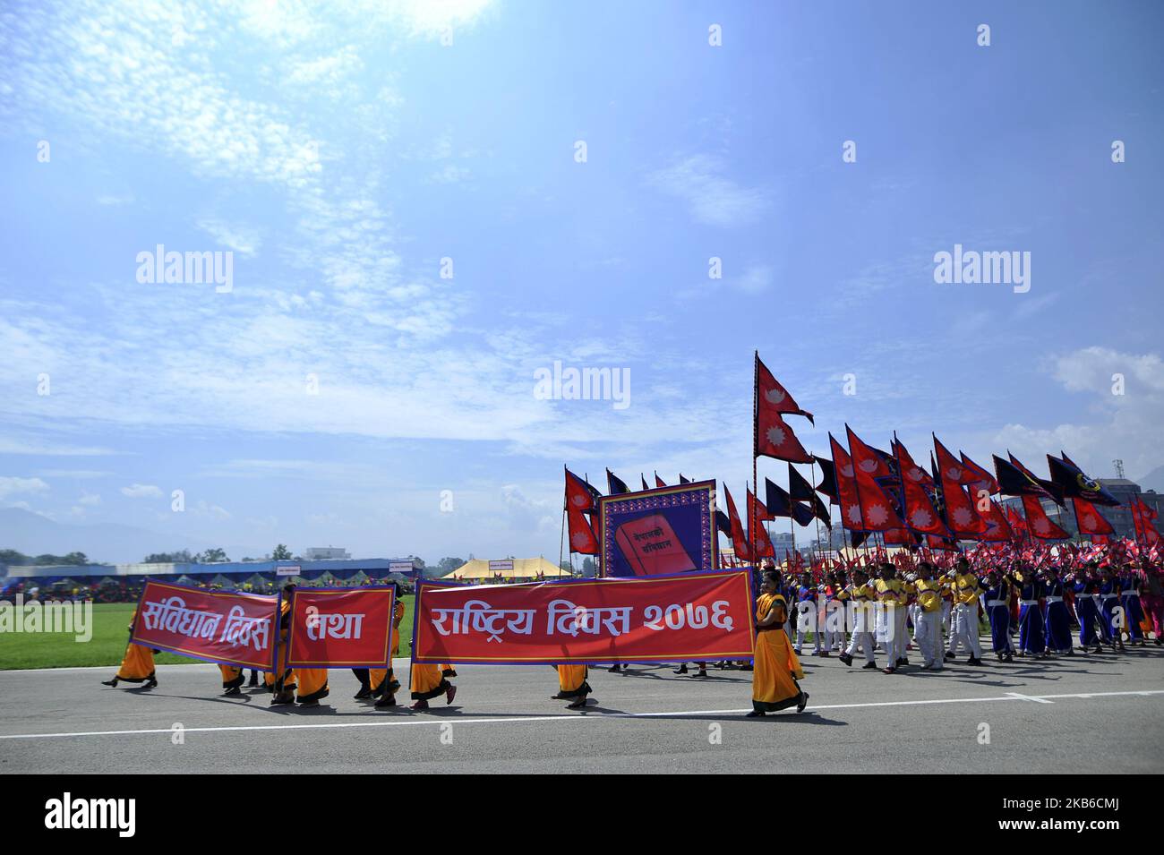 Nepalese people take part in parade during celebration of Constitution ...