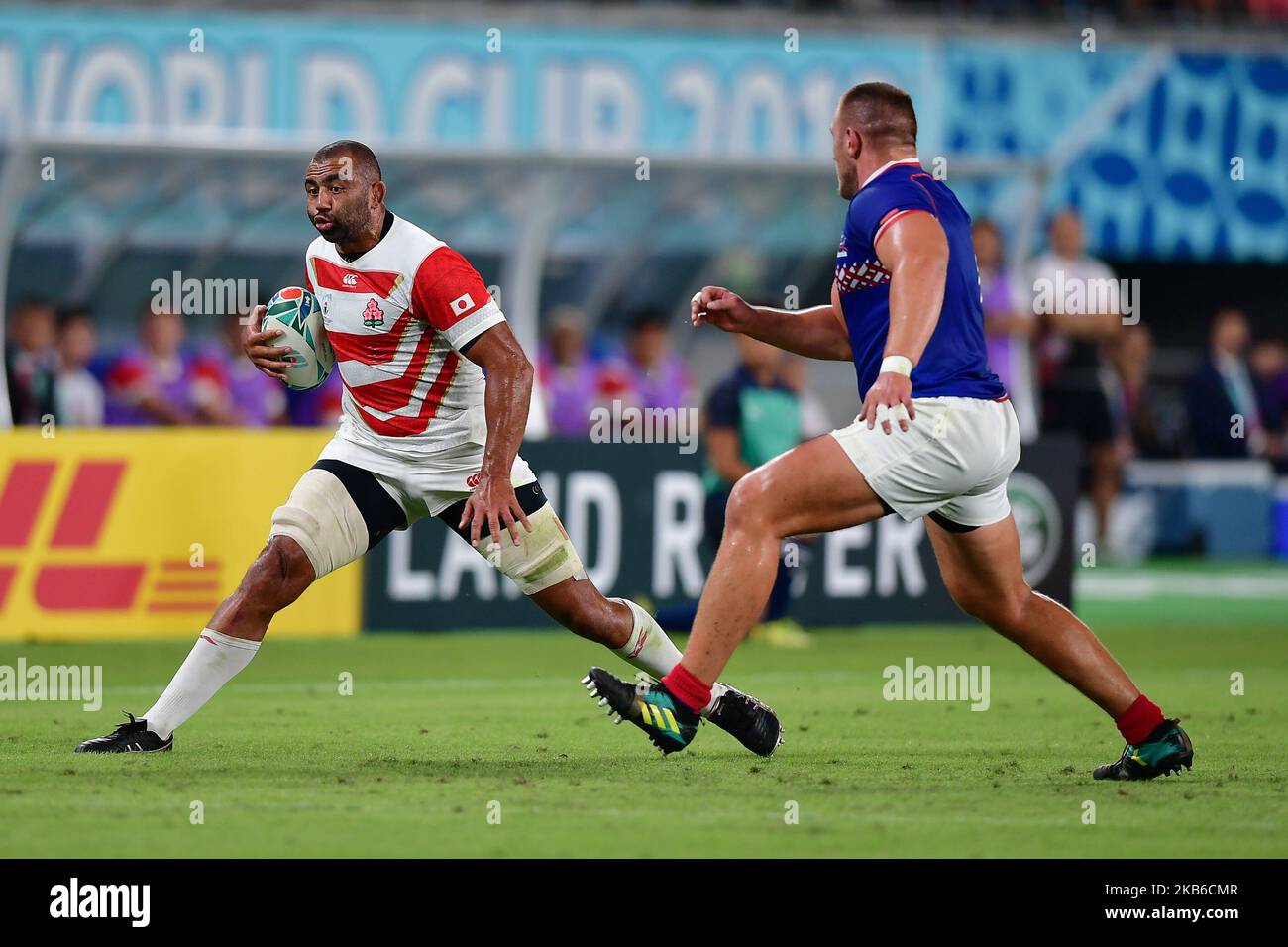 Michael Leitch (c) side steo the russian player during Rugby World Cup ...