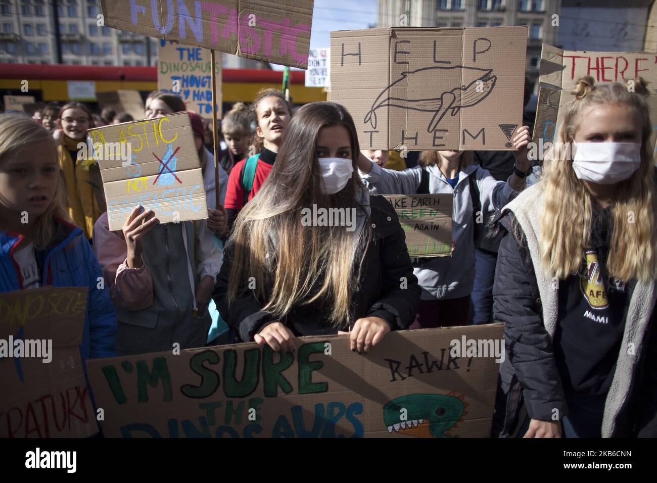 Masked students seen during Youth strike for the climate in Warsaw on ...