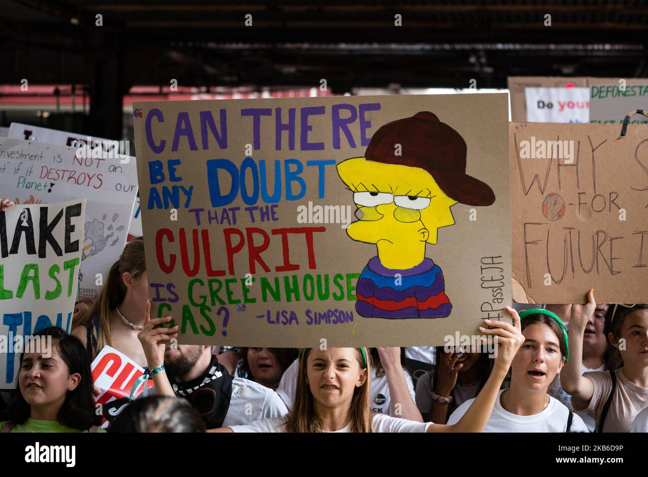 Youth activists and allies march as part of the Climate Strike in ...