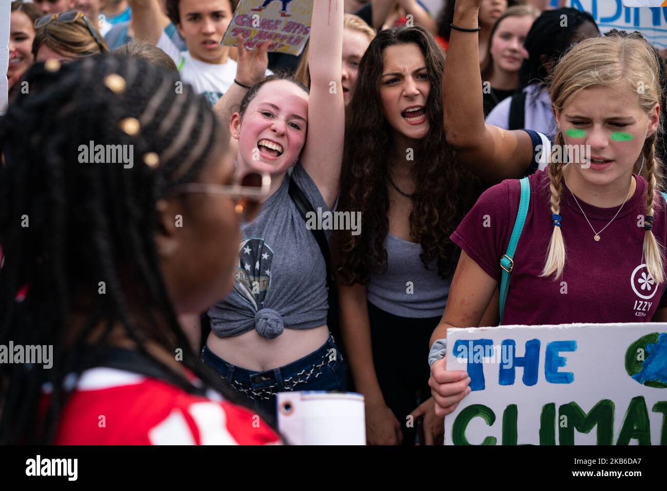 Youth activists and allies march as part of the Climate Strike in ...