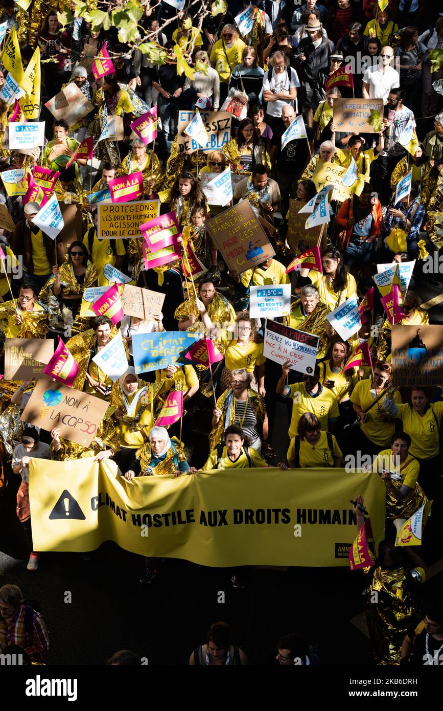 Top view of Amnesty International's procession marching in survival ...