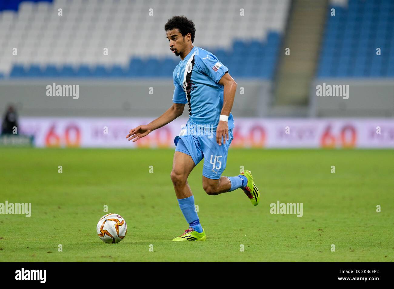 Akram Afif pushes forward during Al Sadd v Umm Salal in the QNB Stars ...