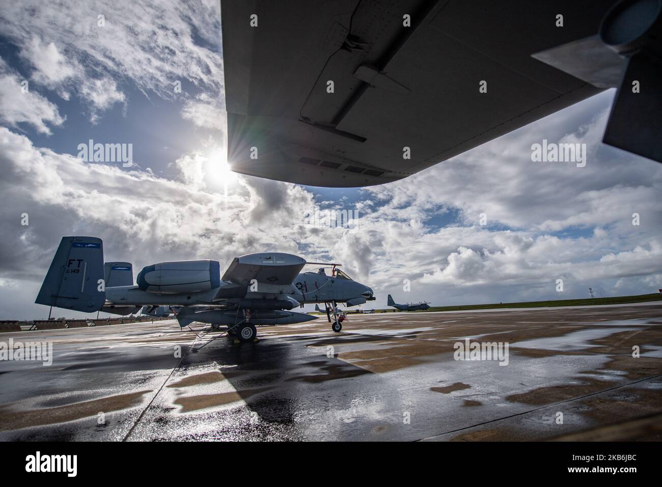 An A-10C Thunderbolt II dries in the sun on the flight line at Andersen ...