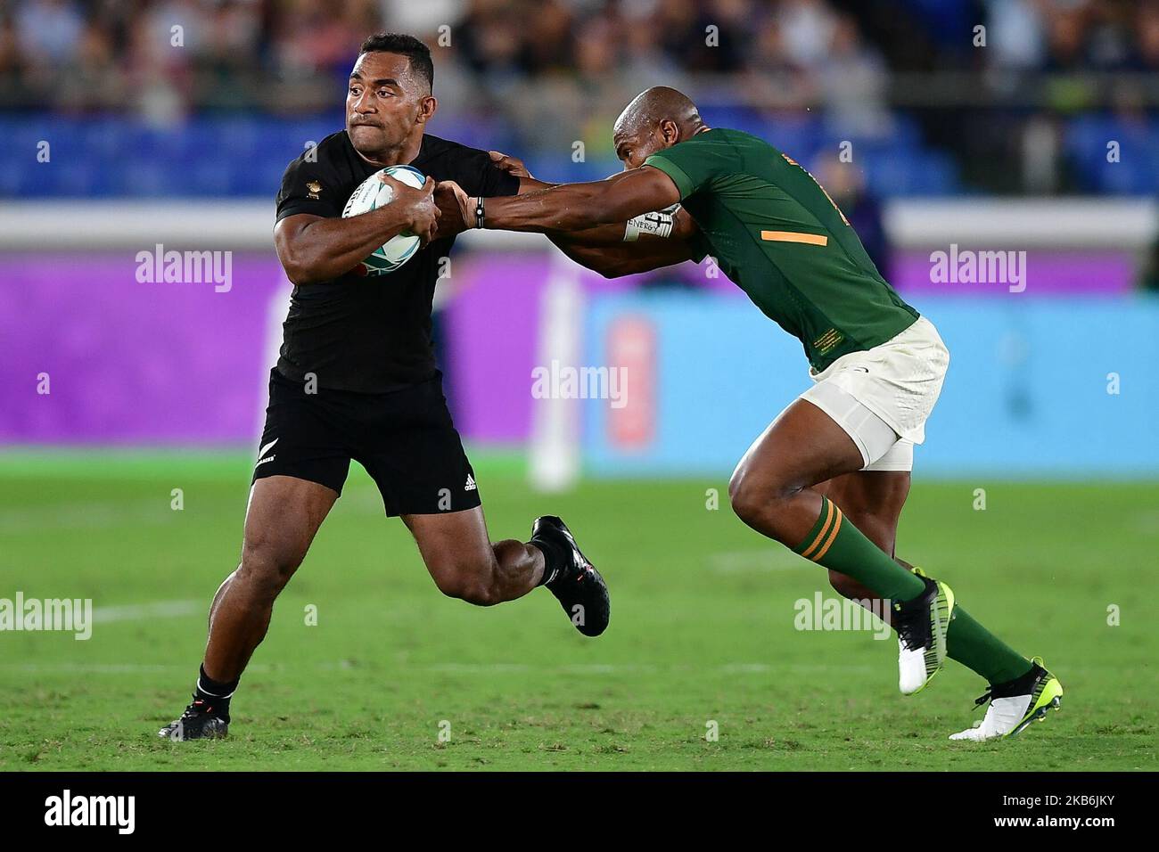 Winger All Blacks Sevu Reece (Left) passes through Cheslin Kolbe (Right ...