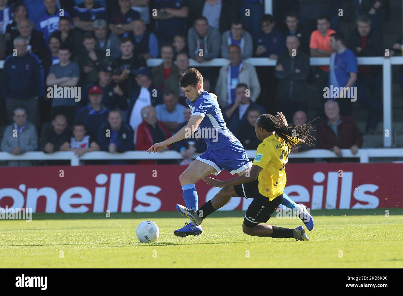 Aaron Cunningham of Hartlepool United in action with Ricky Modeste of ...