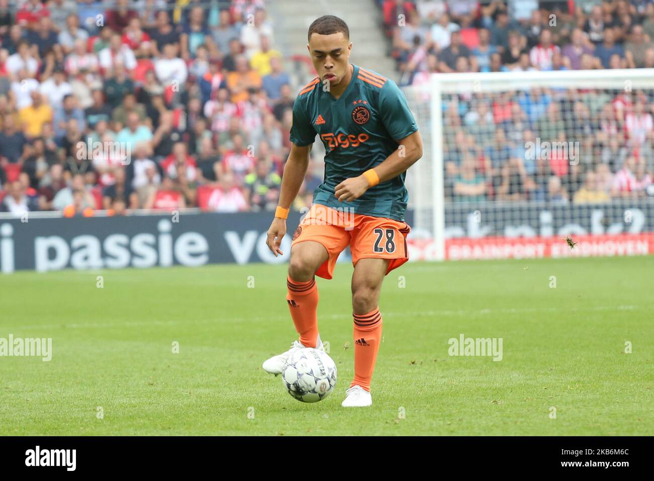 Sergino Dest (Ajax) controls for the ball during a game for the 2019/20 ...