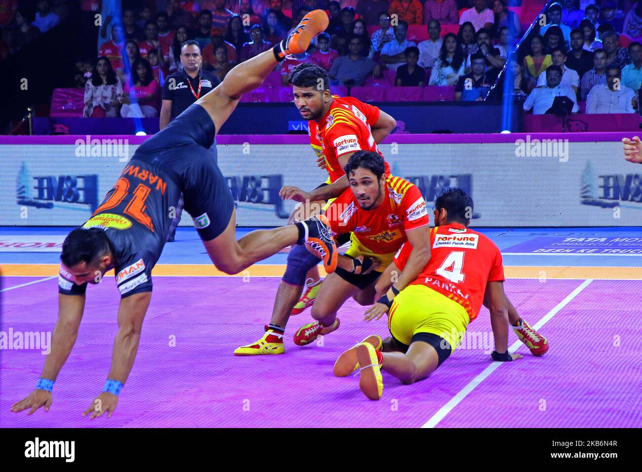 Players of U Mumba (Blue) and Gujrat Fortune Giants ( red and yellow ...