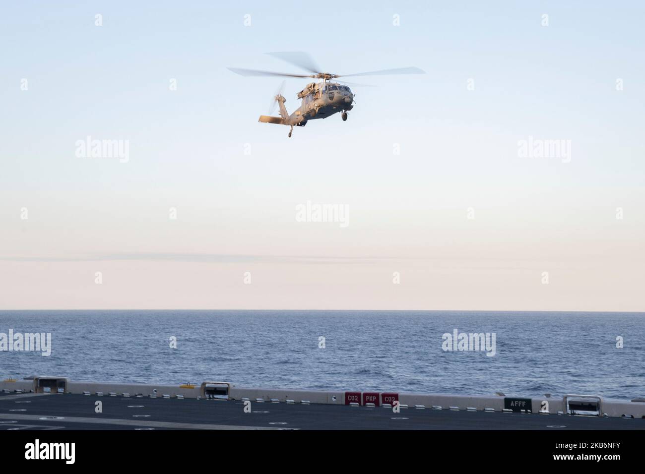 221102-N-EU502-3030 WESTERN PACIFIC OCEAN (Nov. 2, 2022) – An MH-60S ...