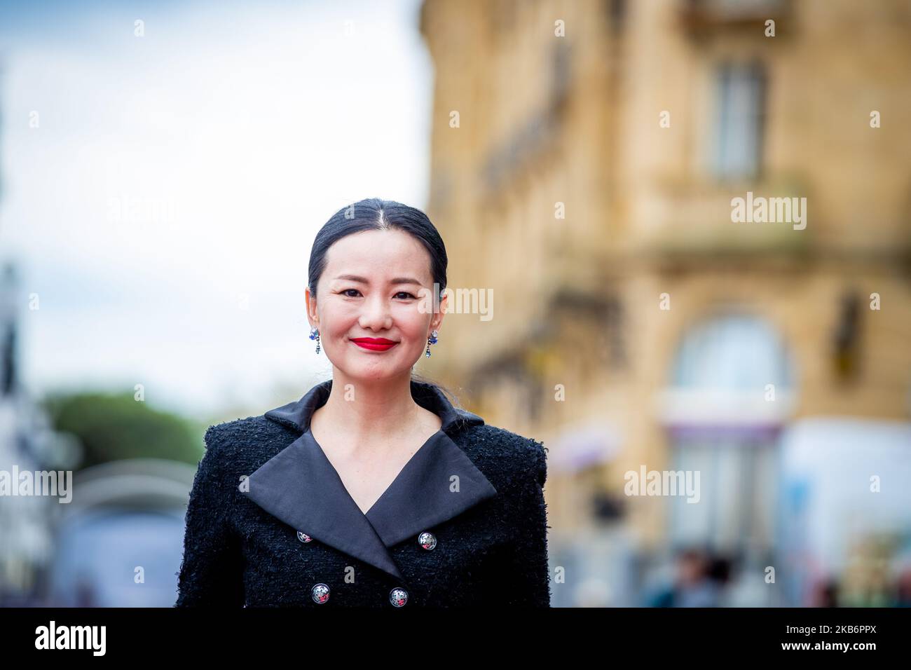 Yong Mei attends the 'Di Jiu Tian Chang (So Long, My Son)' Premiere ...