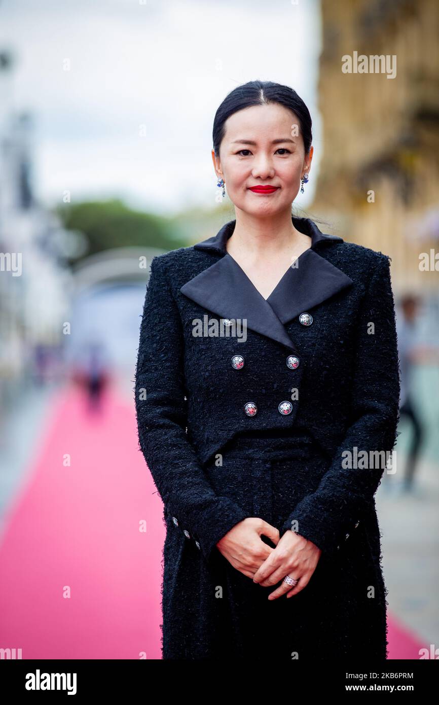 Yong Mei attends the 'Di Jiu Tian Chang (So Long, My Son)' Premiere ...