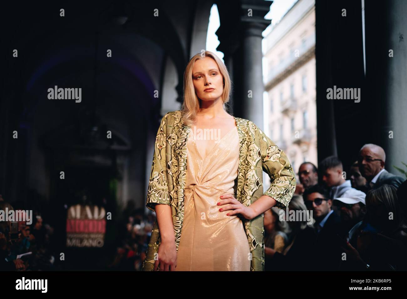 A model walks the runway at the Mad Mood show during the Milan Fashion ...
