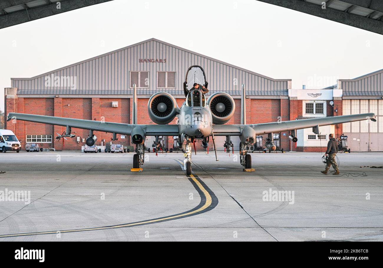 A pilot from the 107th Fighter Squadron gets in an A-10 Thunderbolt II ...
