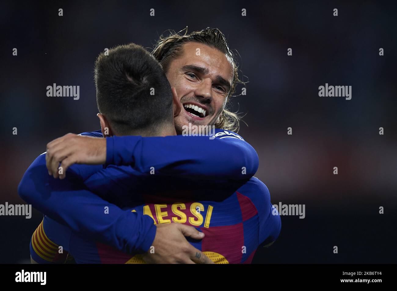 Antoine Griezmann of Barcelona celebrates whit Lionel Messi after ...