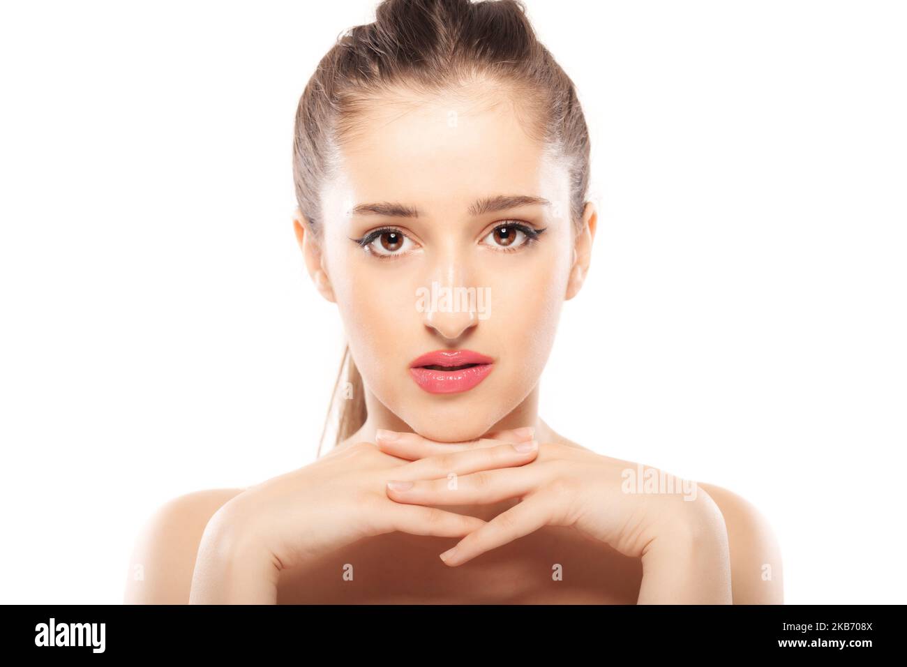 Beautiful girl studio portrait. Making hand gestures and face ...