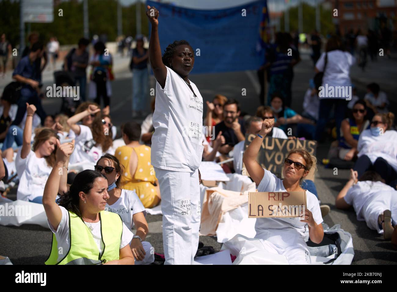 A nurse sings during the die-in. Emergency doctors and nurses took part ...