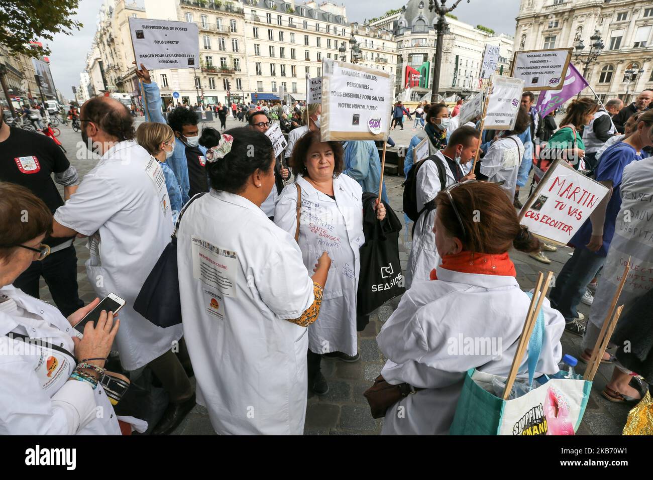 Doctors, nurses and cargivers gather in Paris in front the Hotel de ...