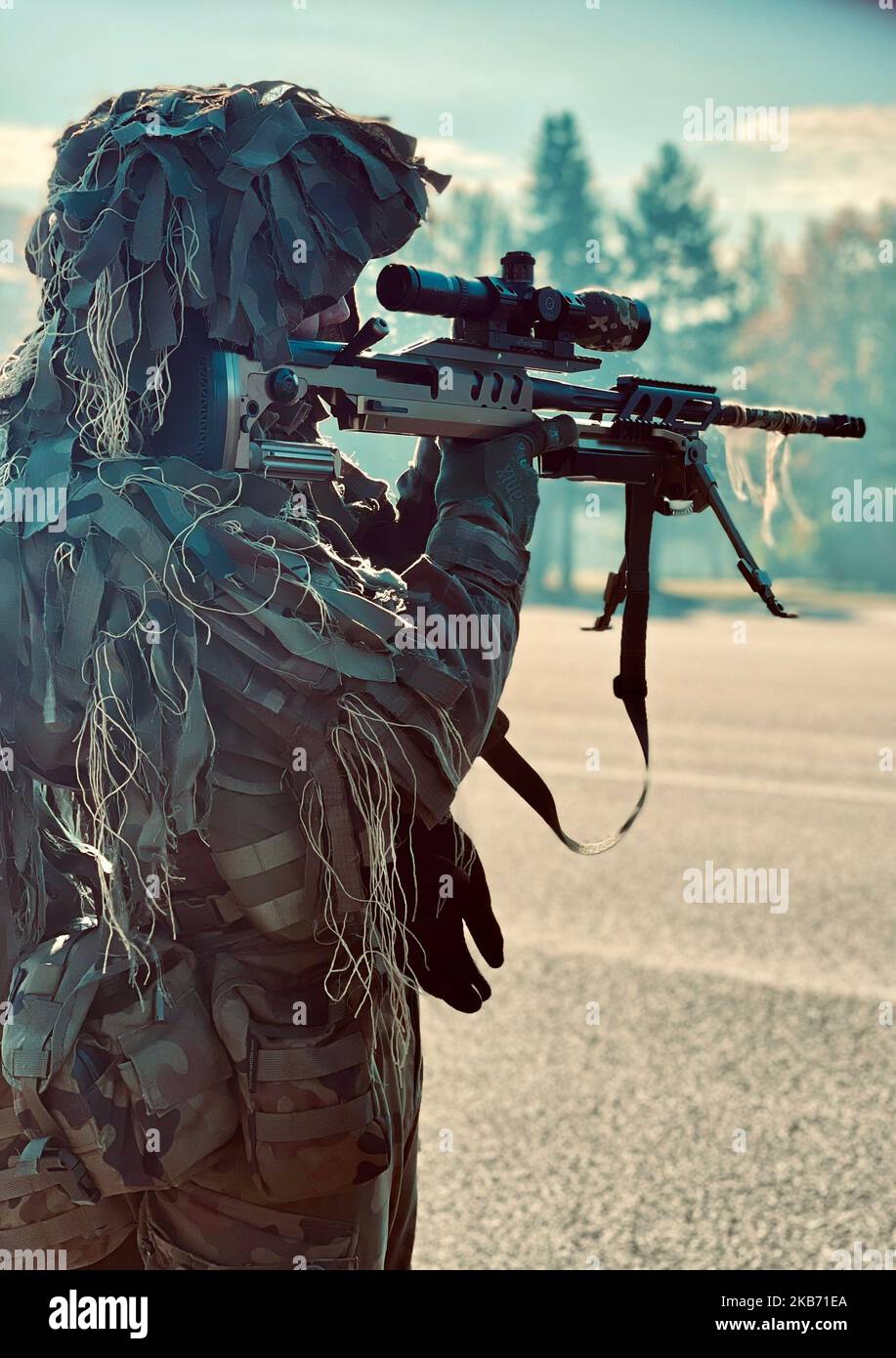 A Polish soldier assigned to the 151st Light Infantry Battalion places ...