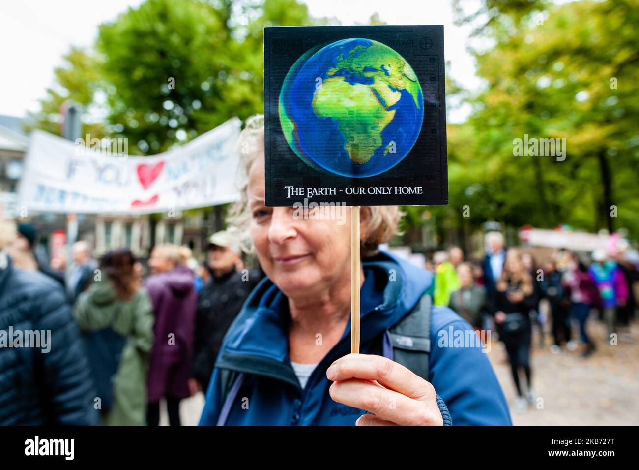 School students and activists gather during a climate strike march on ...