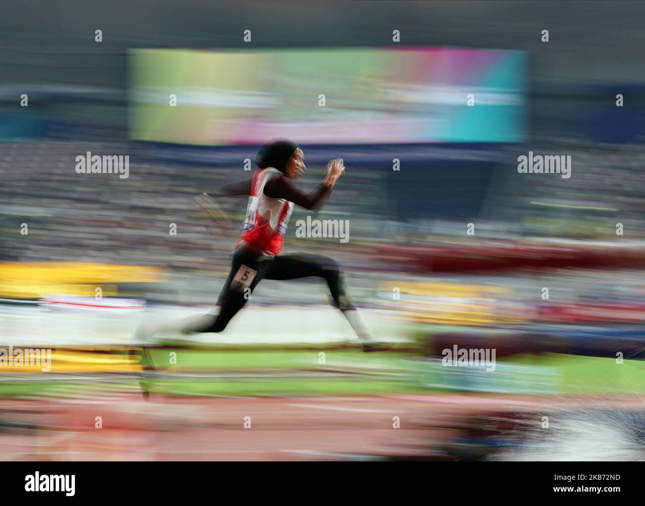 Marwa Bouzayani of Tunisia competing in the 3000 meter steeple chase ...