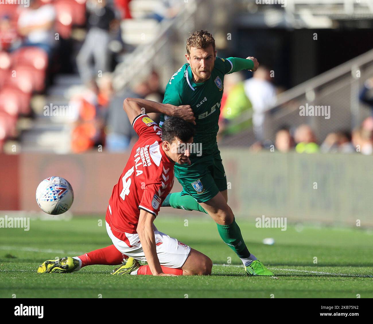 Sam Winnall of Sheffield Wednesday in action with Daniel Ayala of ...