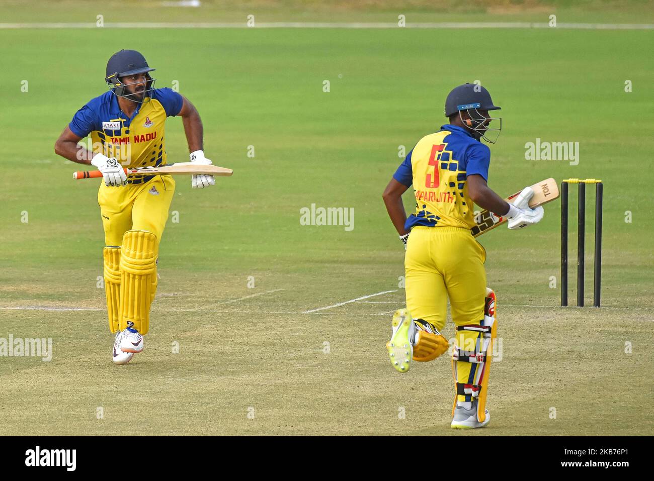 Tamil Nadu Batsman Vijay Shankar and Baba Aparajith run between the ...
