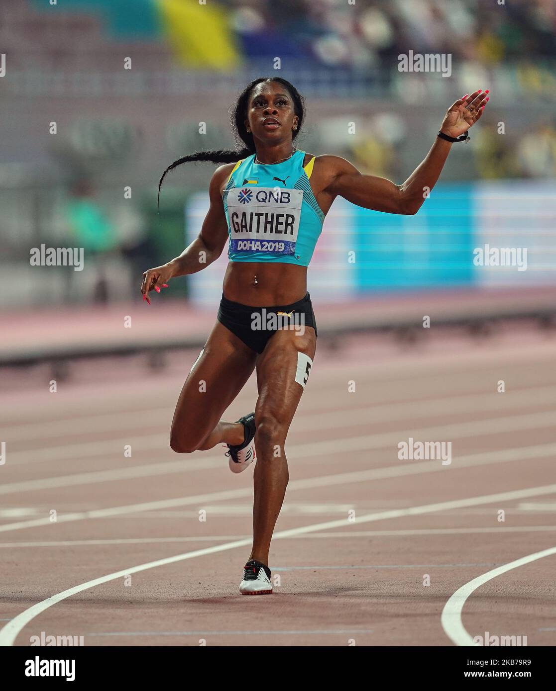 Tynia Gaither of The Bahamas competing in the 200 meter for women ...