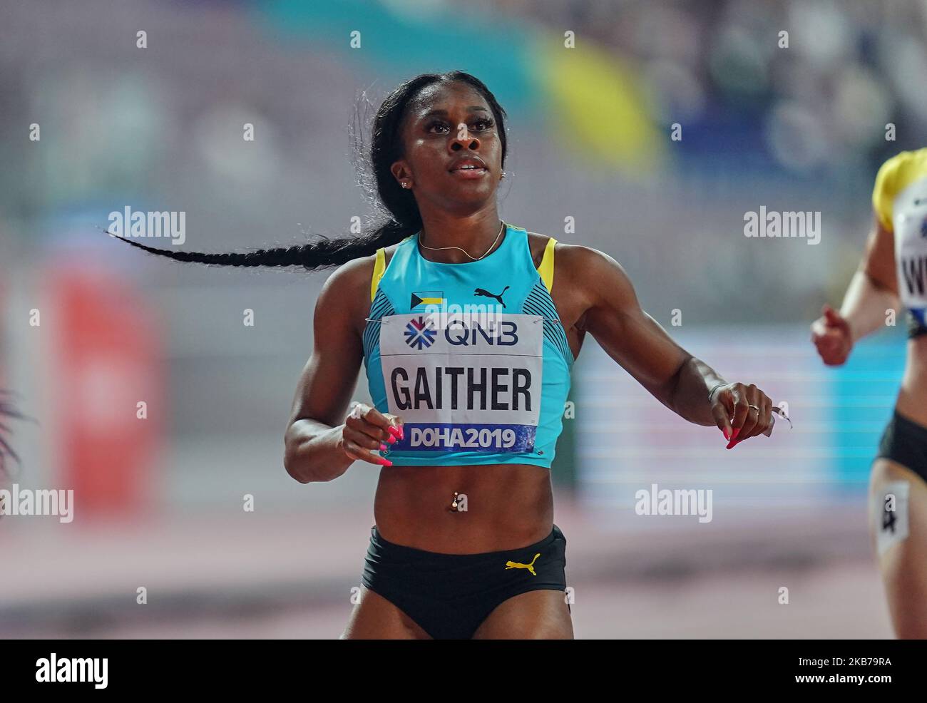 Tynia Gaither of The Bahamas competing in the 200 meter for women ...