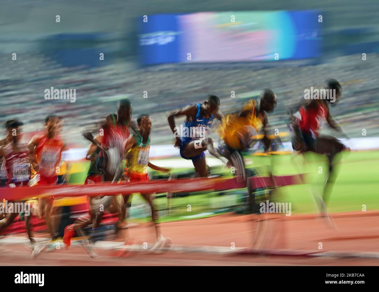 Hillary Bor of United States competing in the 3000 meter steeple chase ...