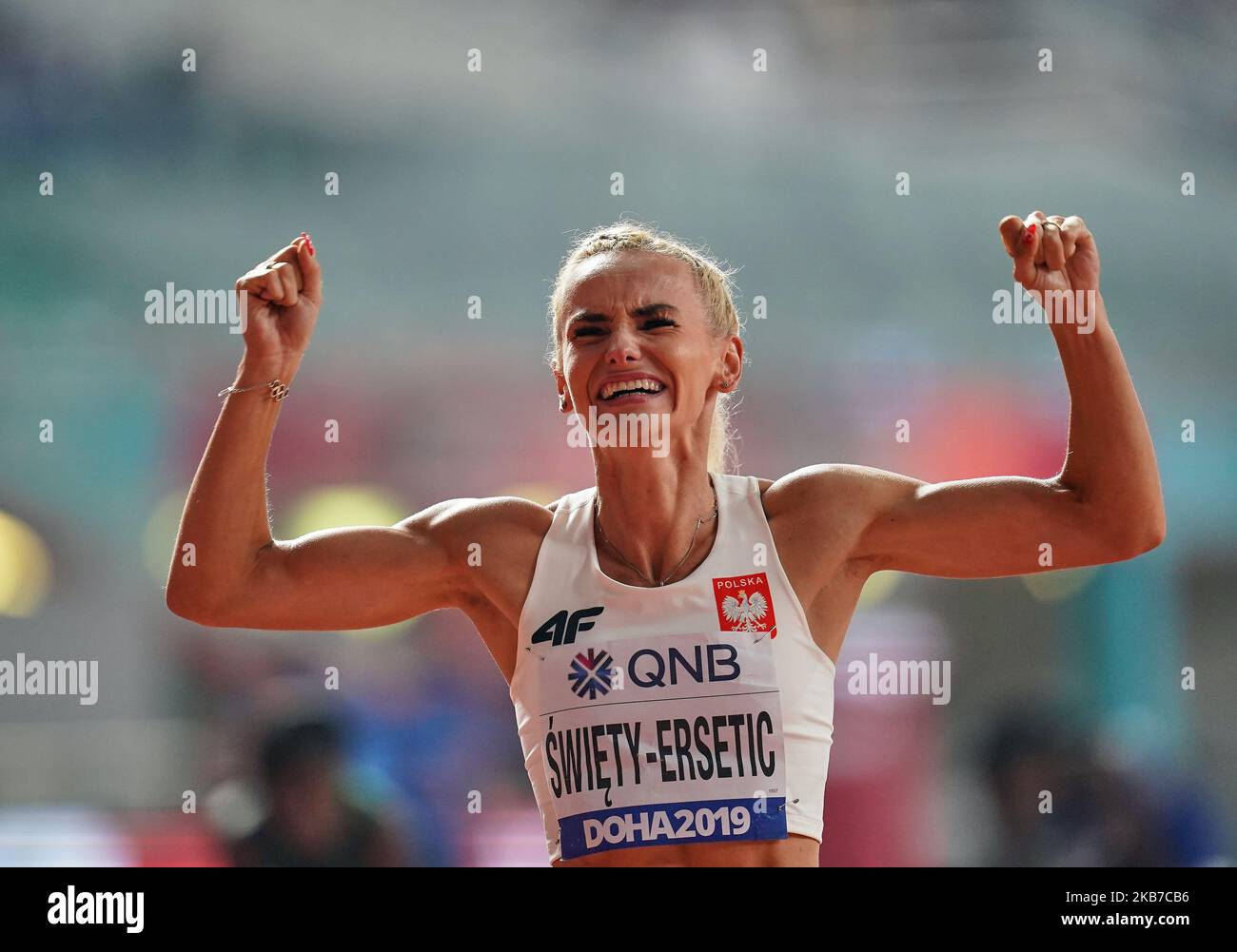 Justyna ?wi?ty-Ersetic of Poland competing in the 200 meter for women ...