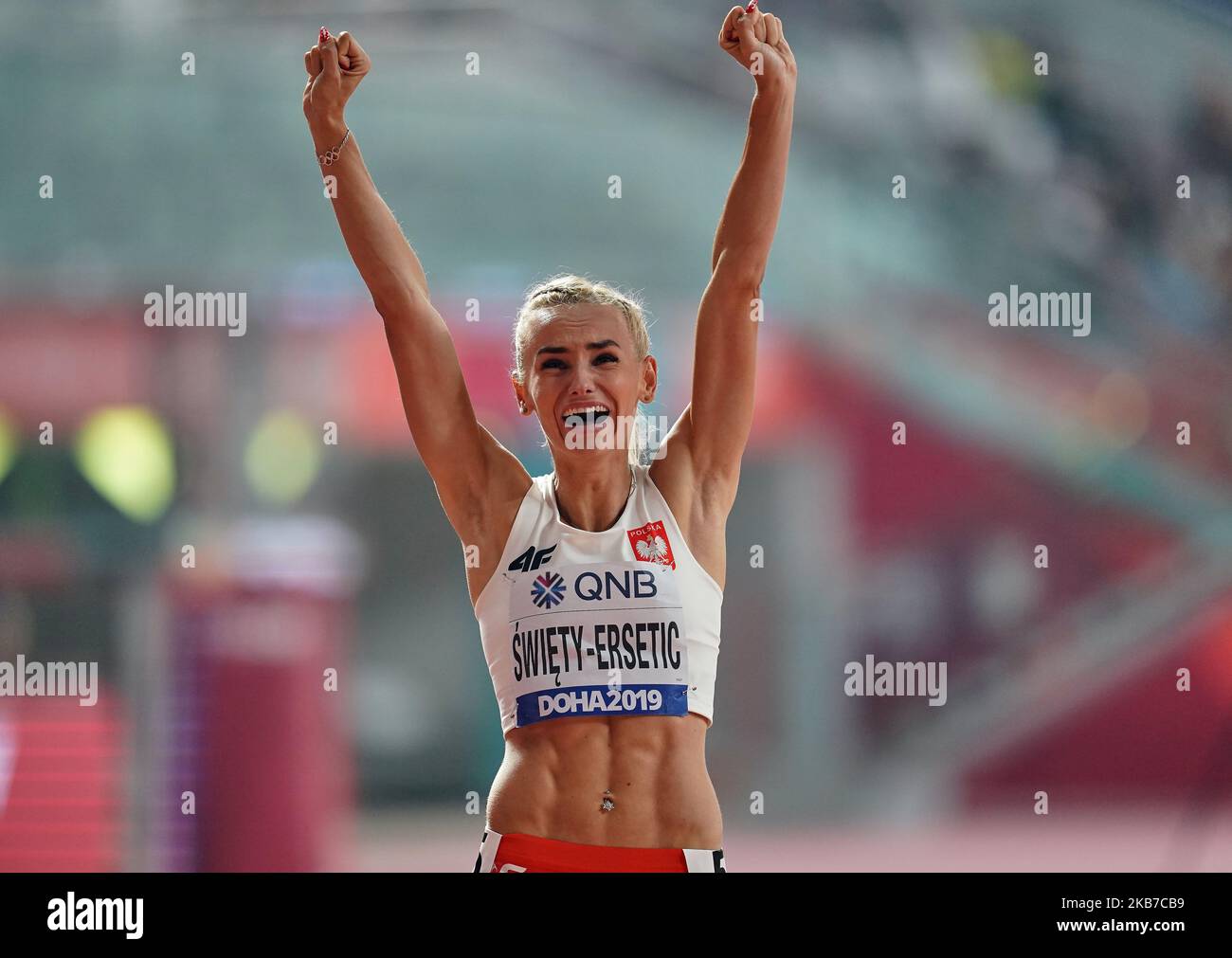 Justyna ?wi?ty-Ersetic of Poland competing in the 200 meter for women ...