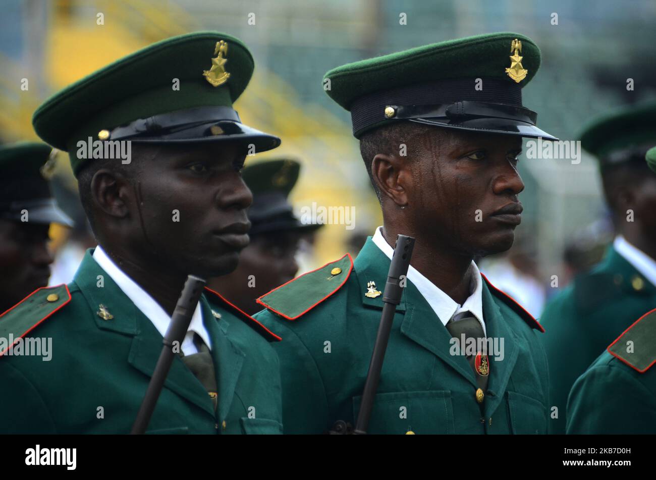 Nigerian soldiers perform during a ceremony to mark the 59th ...