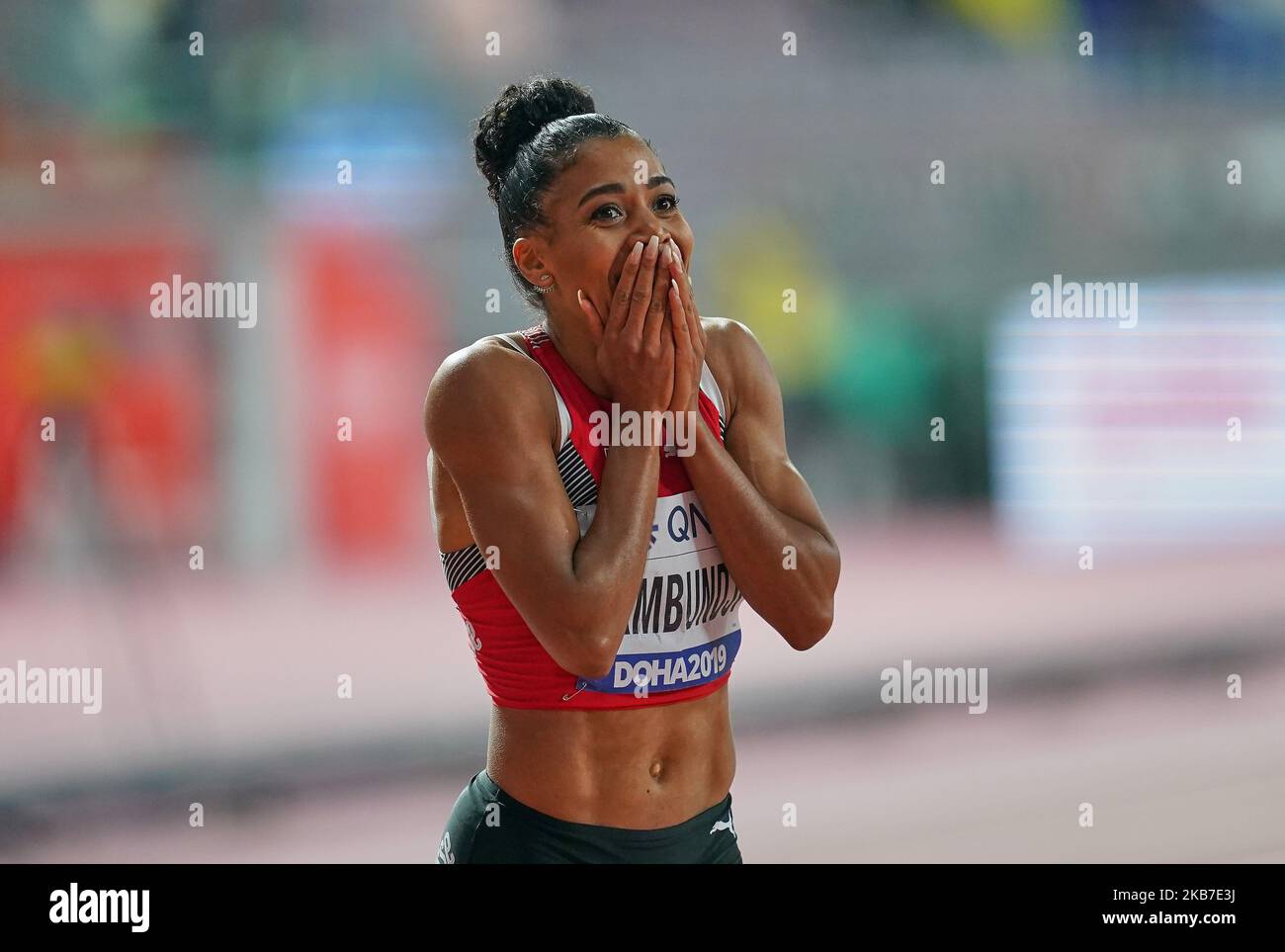 Mujinga Kambundji of Switzerland winning a bronze medal in the 200 ...