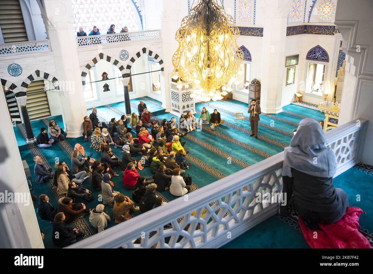 Visitors are seen in the Sehitlik Mosque during the Open Mosque day in ...