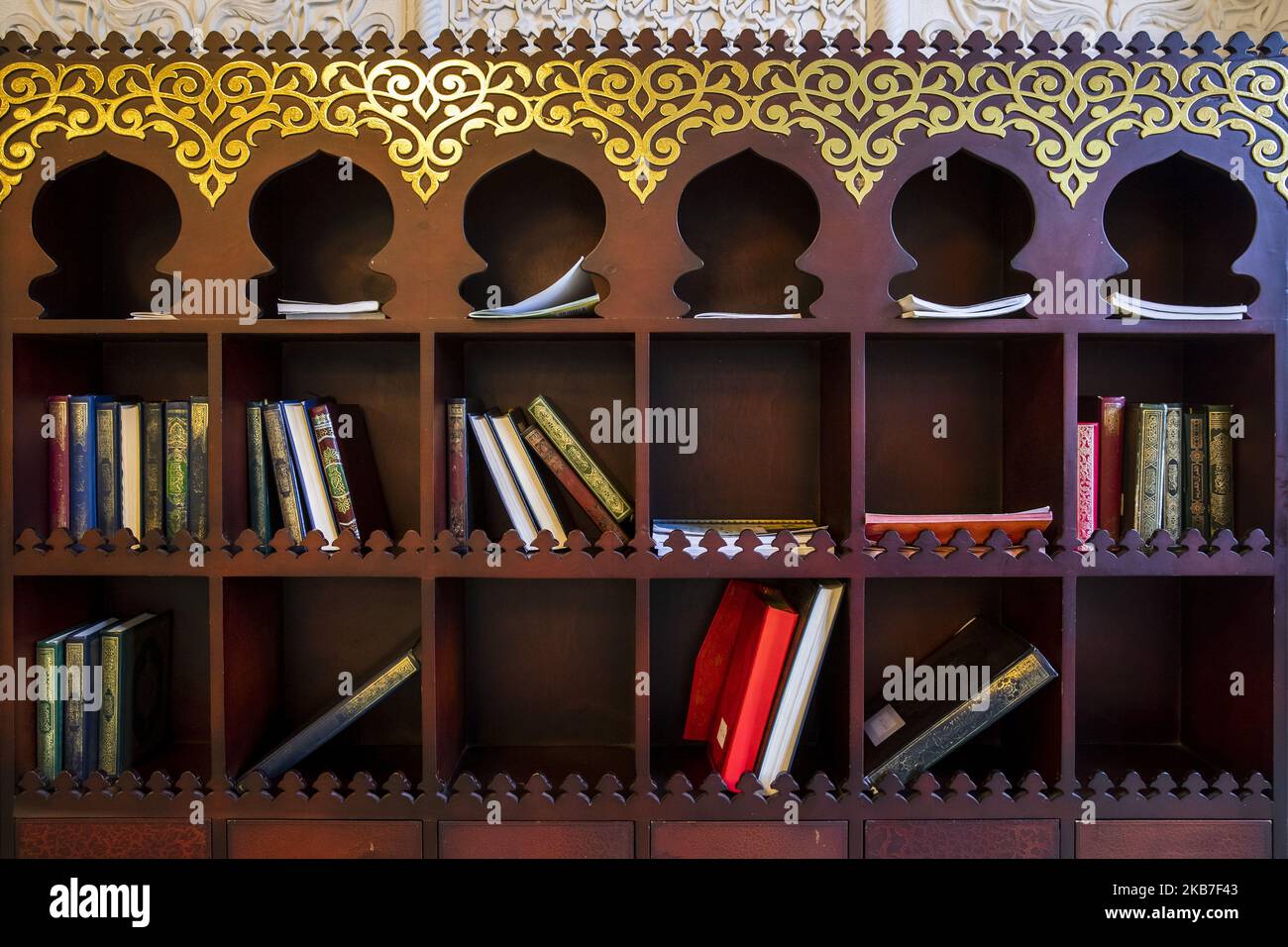 Books in a shelf in the Omar Ibn Al-Khattab Mosque during the Open ...