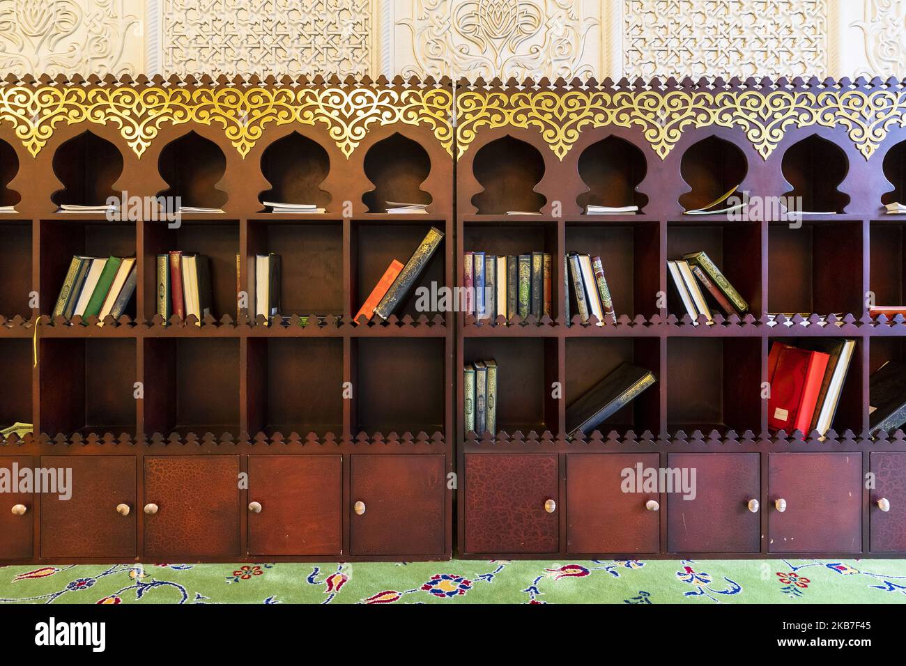 Books in a shelf in the Omar Ibn Al-Khattab Mosque during the Open ...