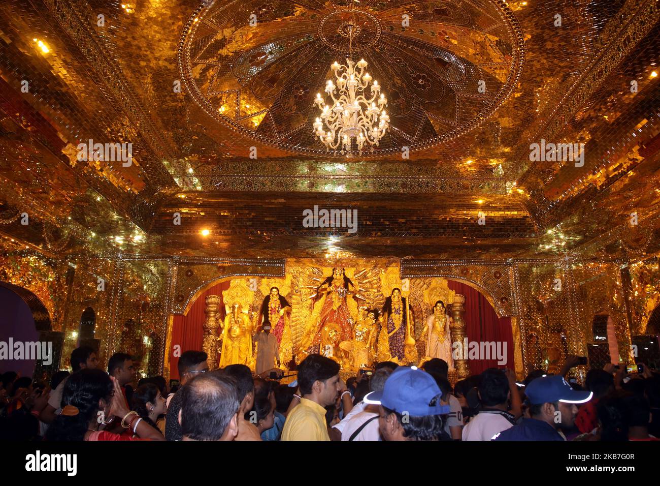 Devotees Â visit Â "pandal," or a temporary structure set up to ...