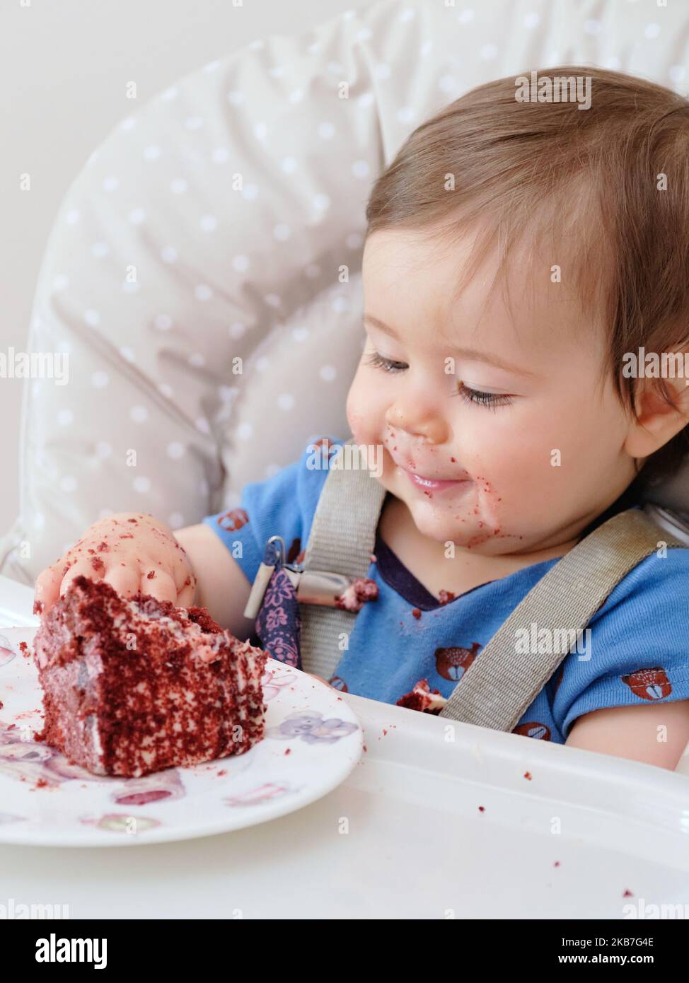 first birthday celebration and fist time eating cake for this little ...